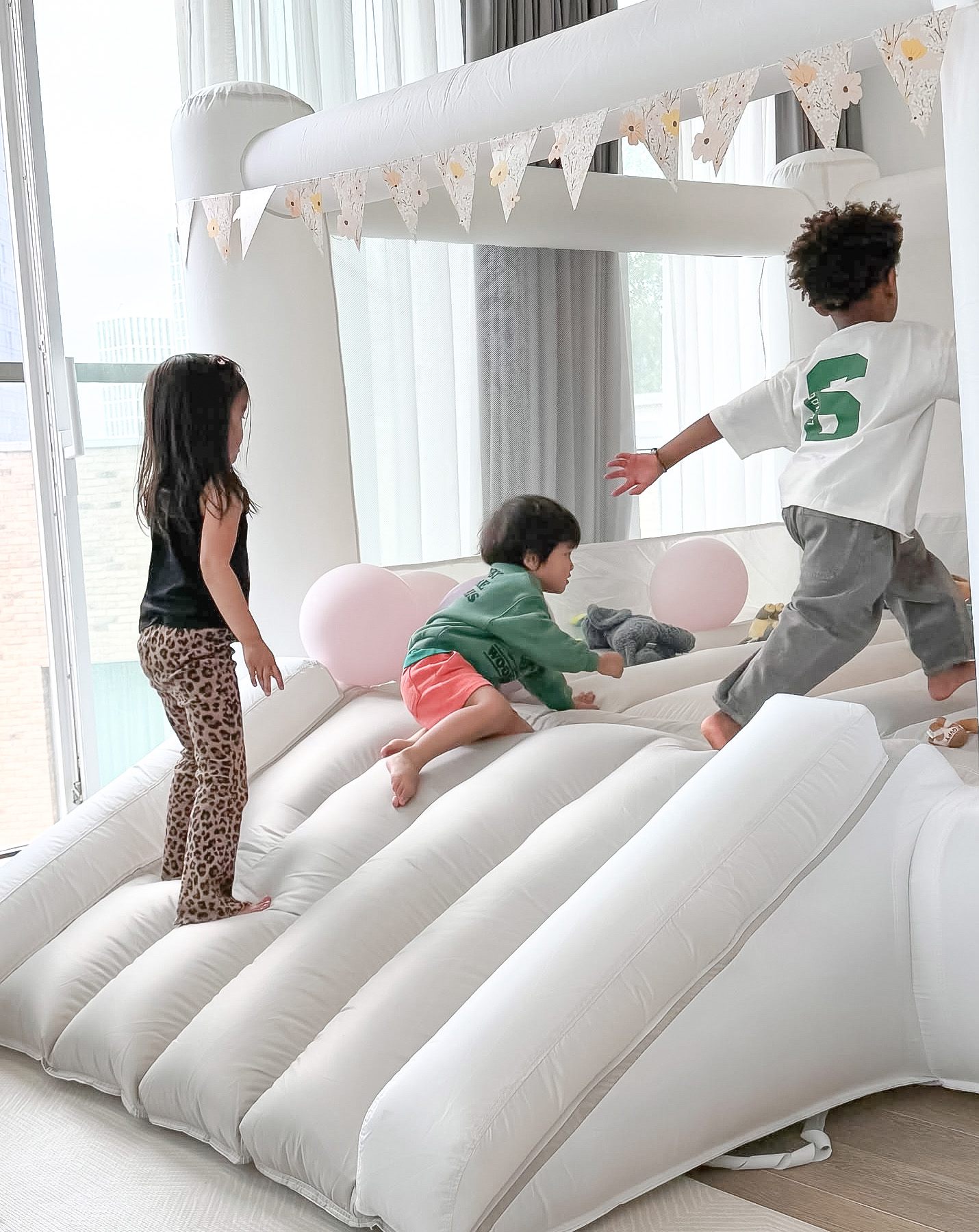 The Mini White Neutral Bounce House | The Happy Bounce Company